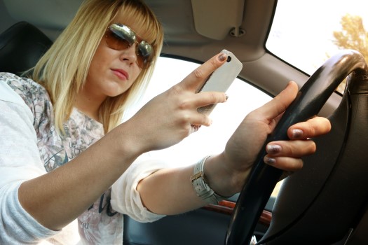 New Law Hand Held Cell Phones Illegal While Driving